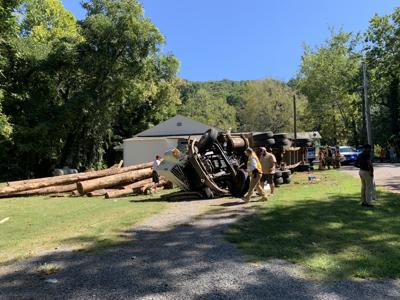 Logging truck smashes house | | times-journal.com