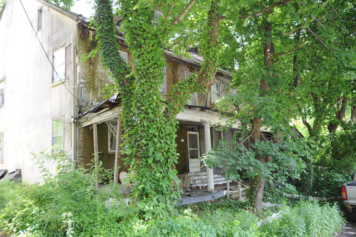 Owner, preservation official talk of restoration for former Flintstone ...