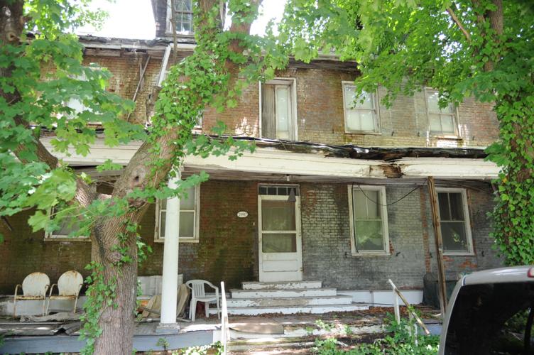 Owner, preservation official talk of restoration for former Flintstone ...