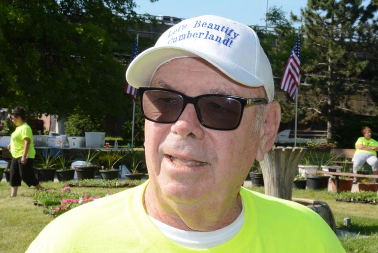 Volunteers spruce up city as part of Day of Caring, Sharing | Local ...