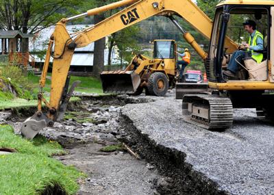 Burst dam leads to flooding, evacuations in Adamant village | News ...