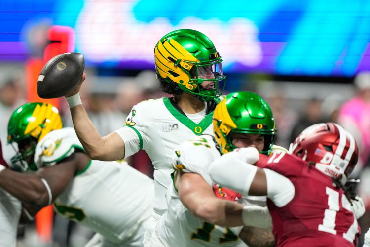 Oregon QB Dante Moore is undecided on the NFL draft or another year ...