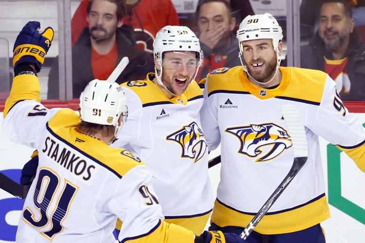 Nicolas Hague breaks tie with 28 seconds left, Predators beat Flames 4 ...