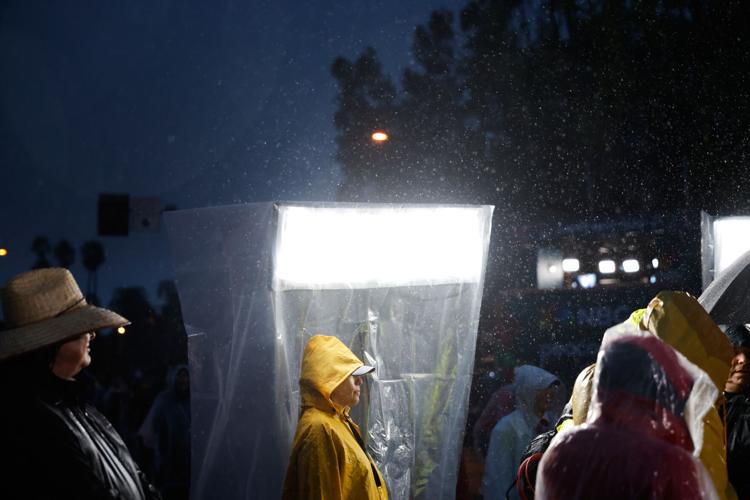 Rain soaks Rose Parade in California and snow squalls hit Midwest and ...