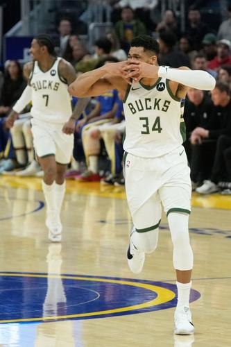 Stephen Curry, Jimmy Butler lead Warriors past Bucks, 120-113 | Pro ...