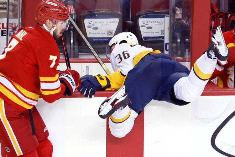 Nicolas Hague breaks tie with 28 seconds left, Predators beat Flames 4 ...