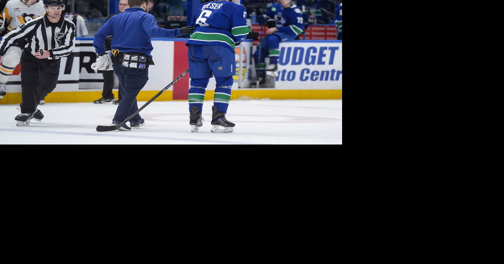 Canucks place winger Boeser and defenseman Buium on injured reserve ...