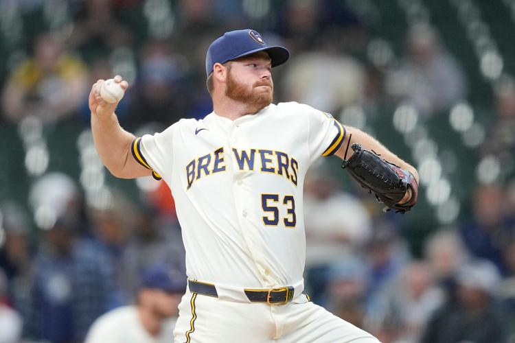 Brewers' Brandon Woodruff goes on injured list after experiencing ...