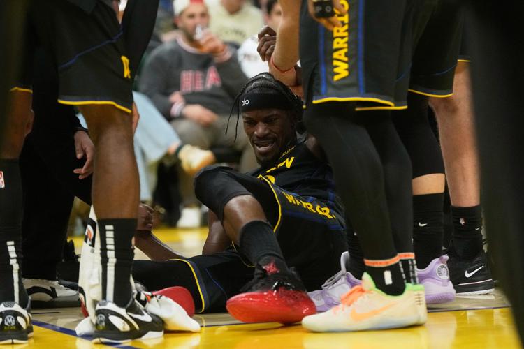 Warriors guard Jimmy Butler tears ACL in his right knee and will miss ...