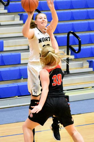 PHOTOS: Huskies’ big 2nd quarter leads them past University, 68-51 ...