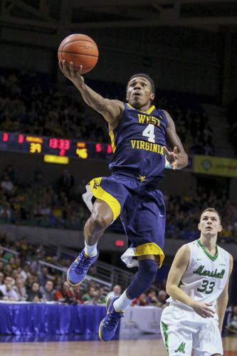 WVU records 18-point win over state foe Marshall | Sports | timeswv.com