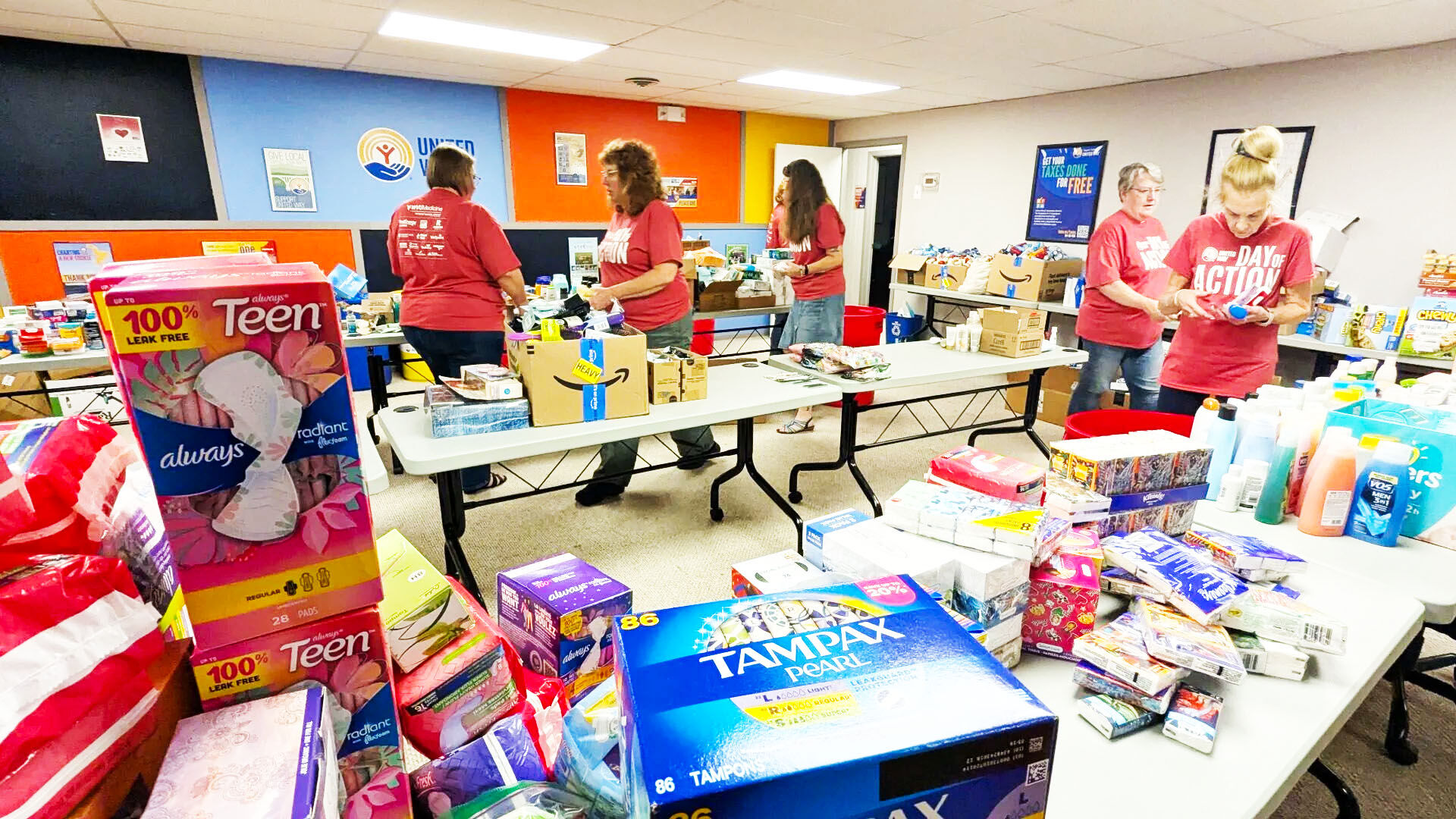 Volunteers pack hygiene goods for kids for Tygart Valley United Way Day ...