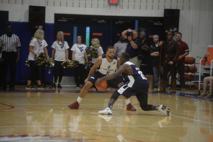 Former WVU players raise money for charity in alumni basketball game ...