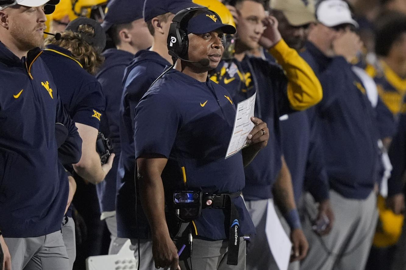 Chad Scott announces departure to Texas as Rich Rod holds first press ...