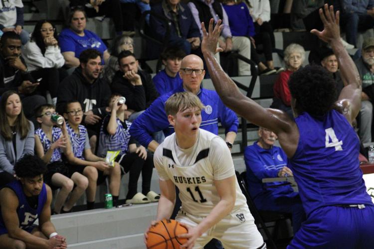 Dobbs scores 24 as No. 1 Fairmont Senior races past North Marion 62-40 ...