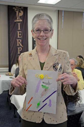 Portrait of former president Larson unveiled at celebration of college ...