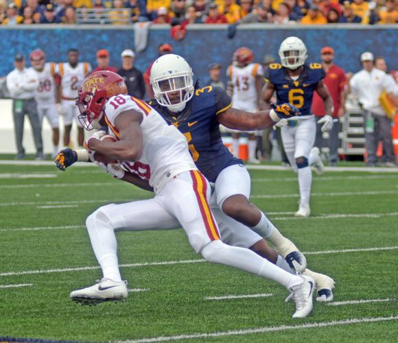 Behind physical play, WVU holds off Iowa State: PHOTOS | Sports ...