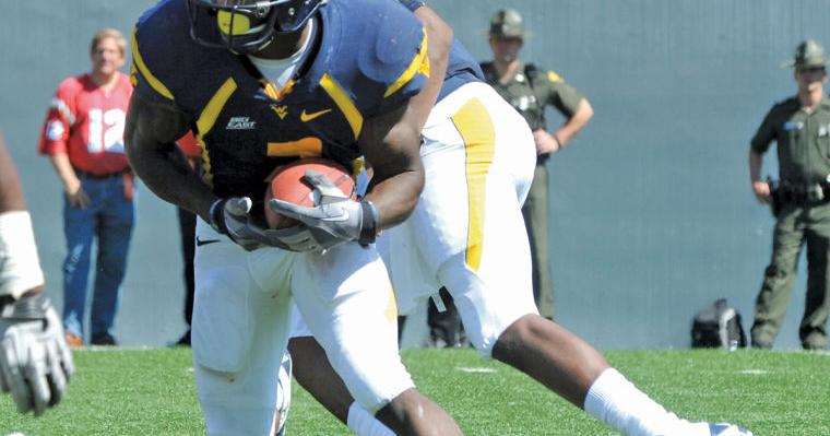 Rodriguez hires WVU running back Noel Devine as analyst, assistant RB ...