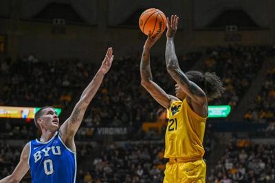 COLUMN: Despite his travails, Battle resolute about future | WVU ...