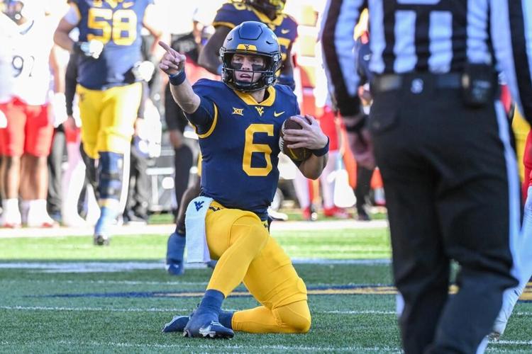Greene and White shine in Mountaineers' 42-21 win against Cincinnati at ...