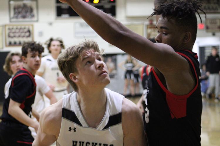 Morris' double-double lifts North Marion past Weir 70-51 in regular ...