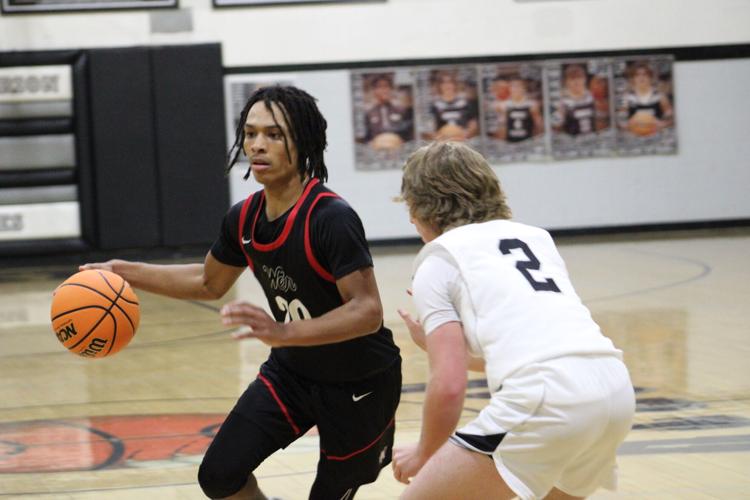 Morris' double-double lifts North Marion past Weir 70-51 in regular ...