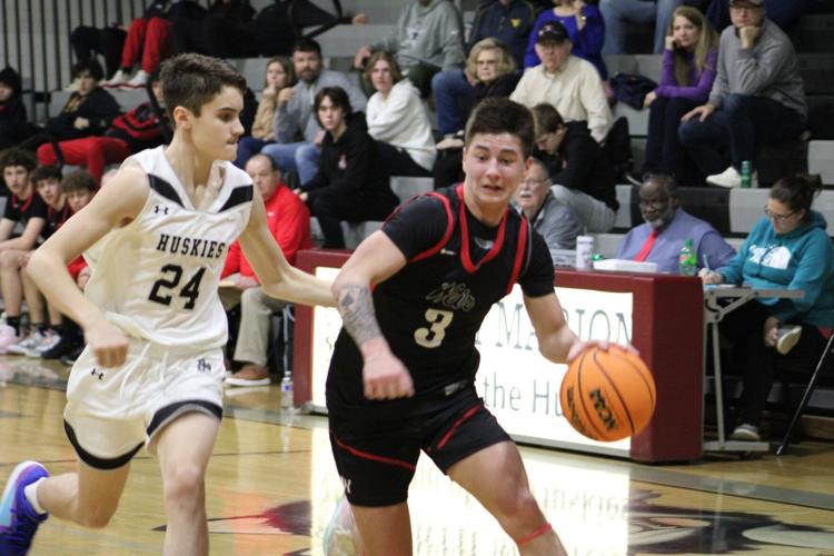 Morris' double-double lifts North Marion past Weir 70-51 in regular ...