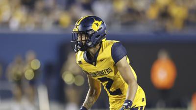 WVU receiver Rodney Gallagher says Rodriguez is pushing players to be ...