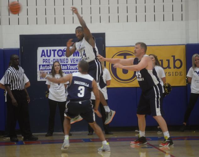 Former WVU players raise money for charity in alumni basketball game ...