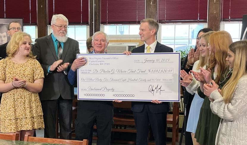 State hands over $1M in unclaimed funds to Mannington school | Local ...