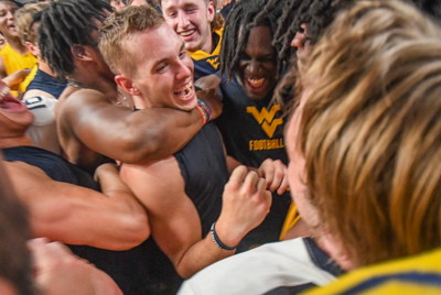 COLUMN: How one WVU player is giving back to kids and another earns ...
