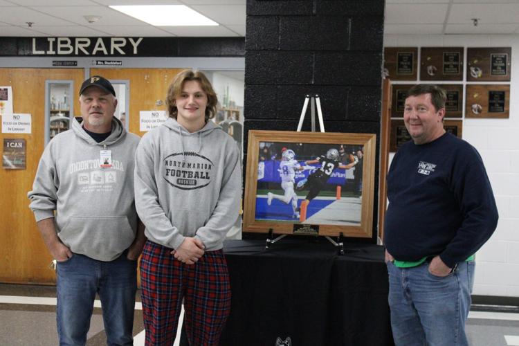North Marion's Frey honored with framed picture of 'The Play of the ...