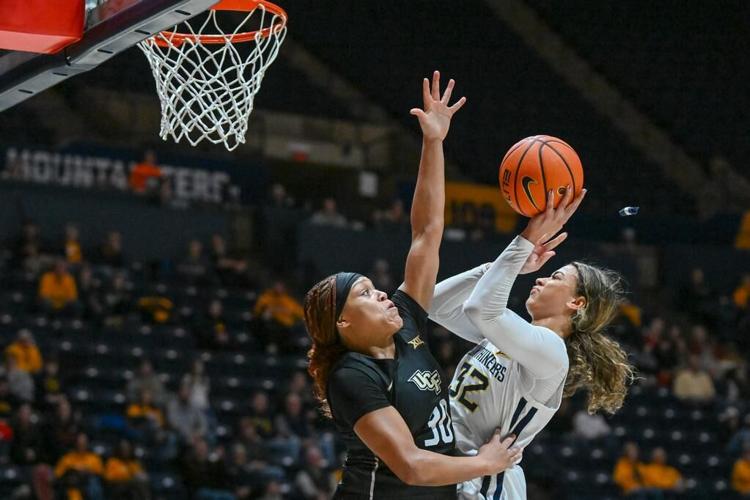 Led by 'unassuming superstar,' No. 22 WVU women's hoops hottest ticket ...