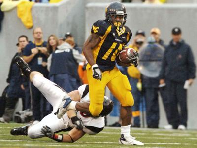 Former Mountaineer Slaton retiring from football | Sports | timeswv.com