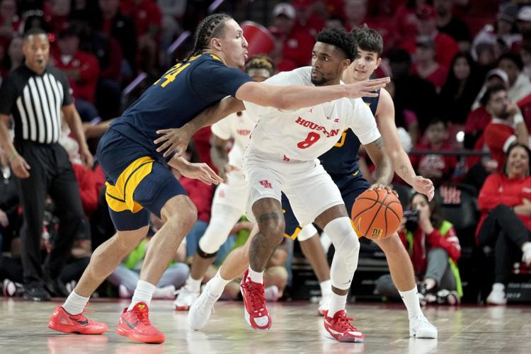 Tough day on the hardcourt for WVU basketball with both teams falling ...