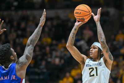 Mountaineers hold on to defeat No. 3 Kansas at home, 91-85 | WVU ...
