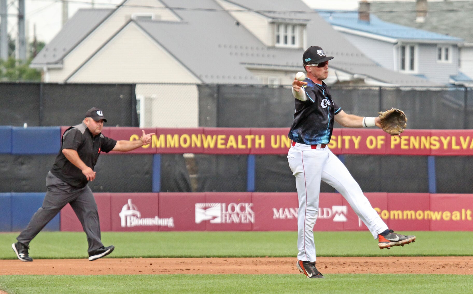 Kyle Schupmann makes the out at first | Baseball | tiogapublishing.com