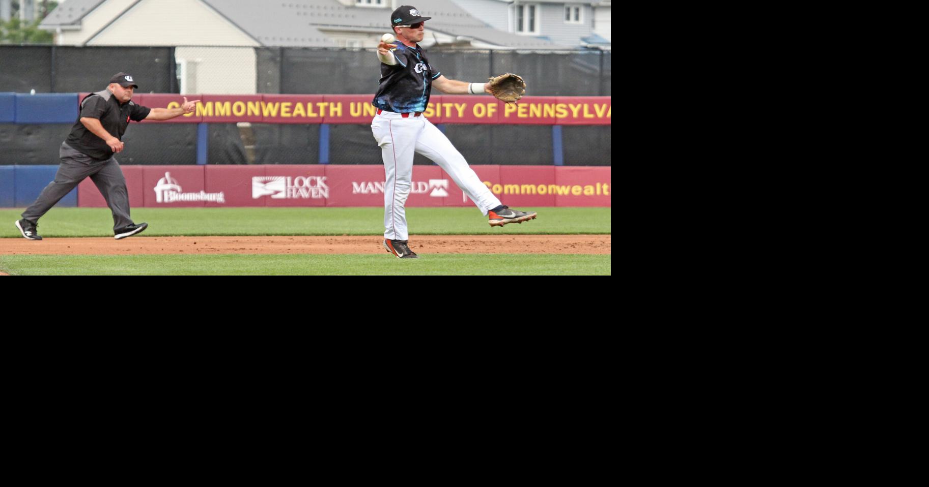 Kyle Schupmann makes the out at first | Baseball | tiogapublishing.com