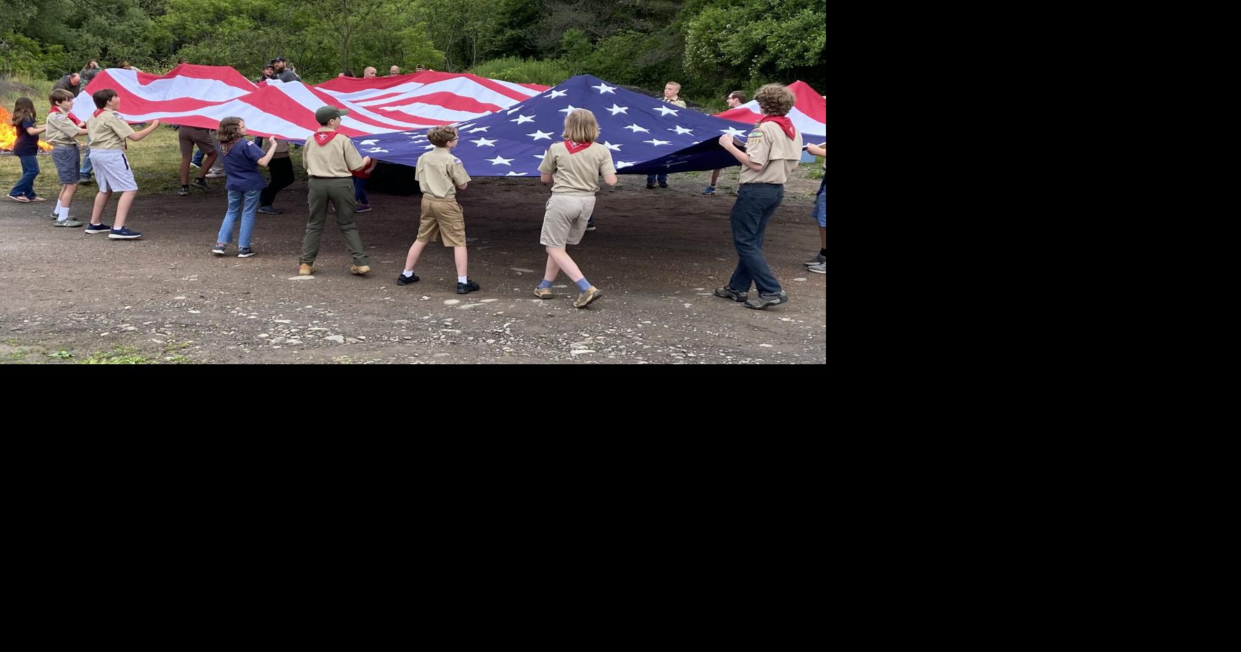 Getting ready to properly fold the giant flag in preparation for the PA ...