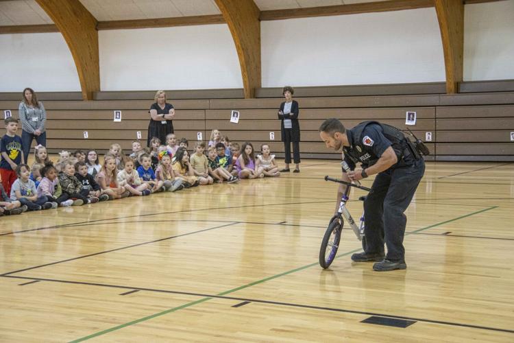 ECLC students hear about bike safety, receive free helmets from Elks ...