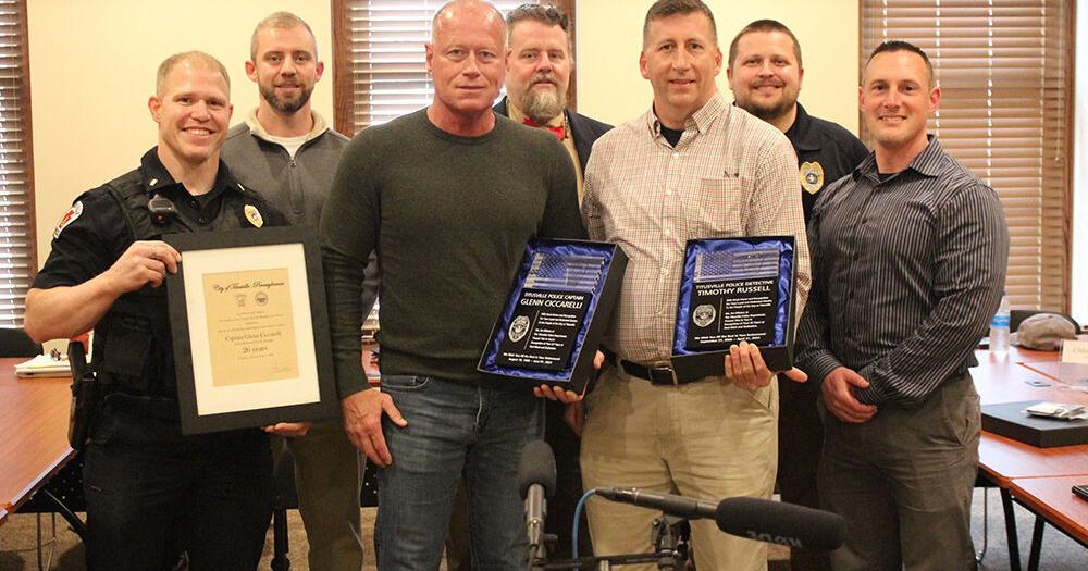 Retired police chief, detective honored at city council meeting | News ...