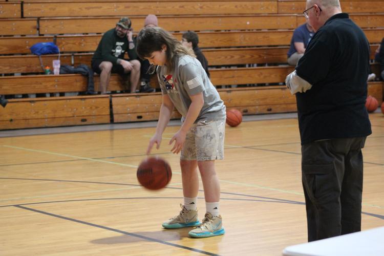 Kids sink baskets at Elks Lodge annual Hoop Shoot | Multimedia ...