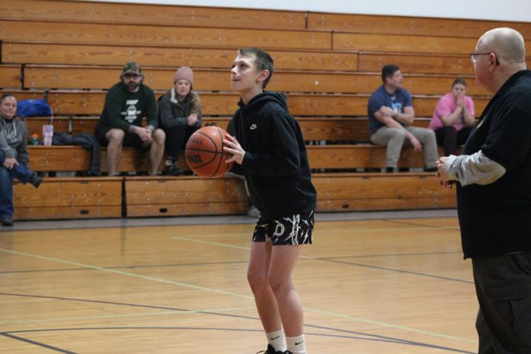 Kids sink baskets at Elks Lodge annual Hoop Shoot | Multimedia ...