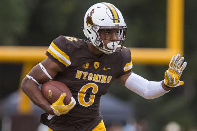Linebacker convert Trey Woods brings physicality to Wyoming running ...