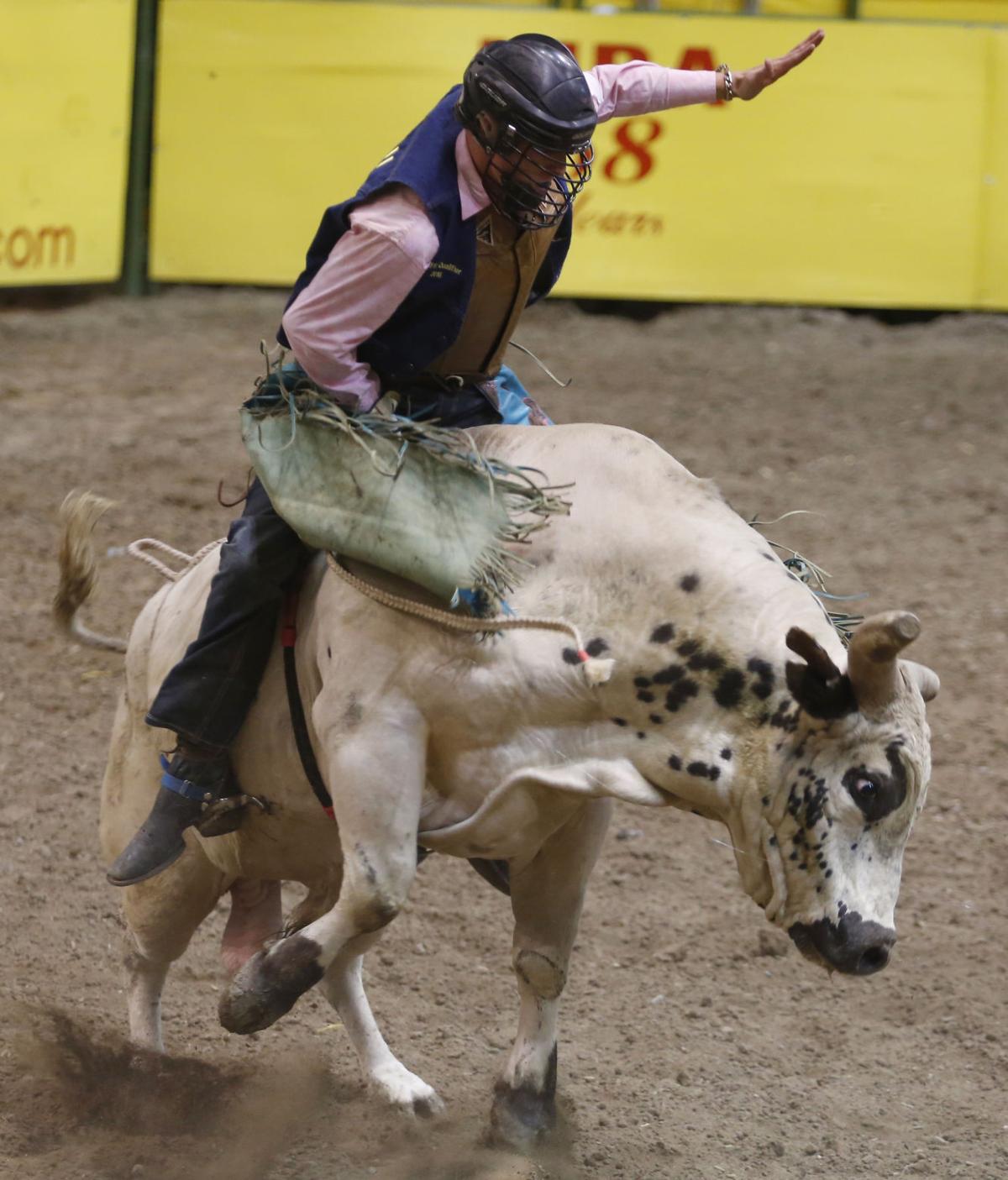 Southern Arkansas bull rider Tyler Lewis goes in blind, comes out on top
