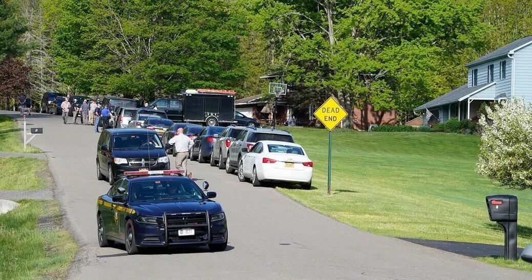 From the accused shooter's hometown: prayers and bewilderment
