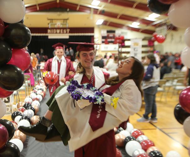 Midwest High School graduates 100th class