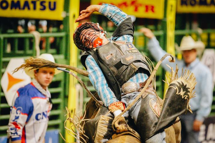 Casey Roberts wins first go-round of bull riding at College National ...