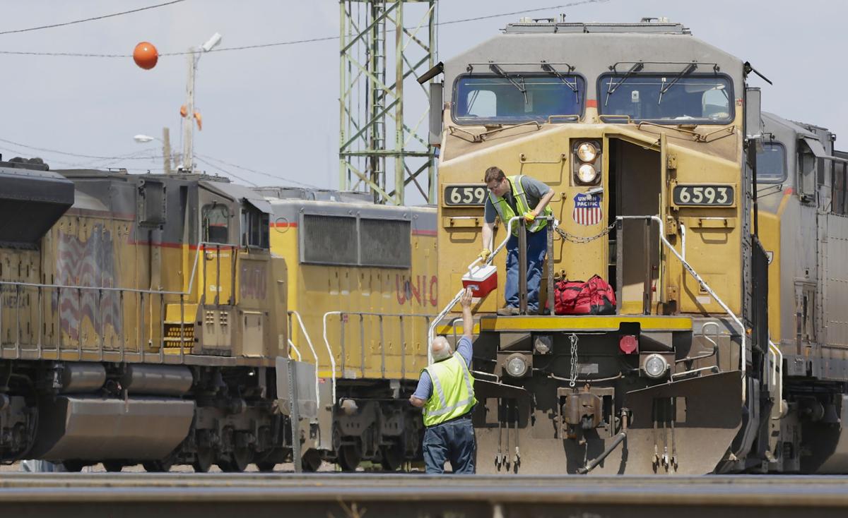 Workers, rail companies at odds over train crew size rules