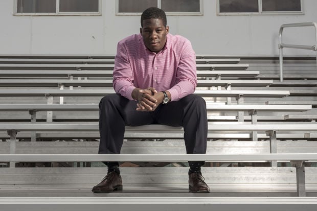 Former UW player J.J. Quinlan survives near-death experiences, finds ...